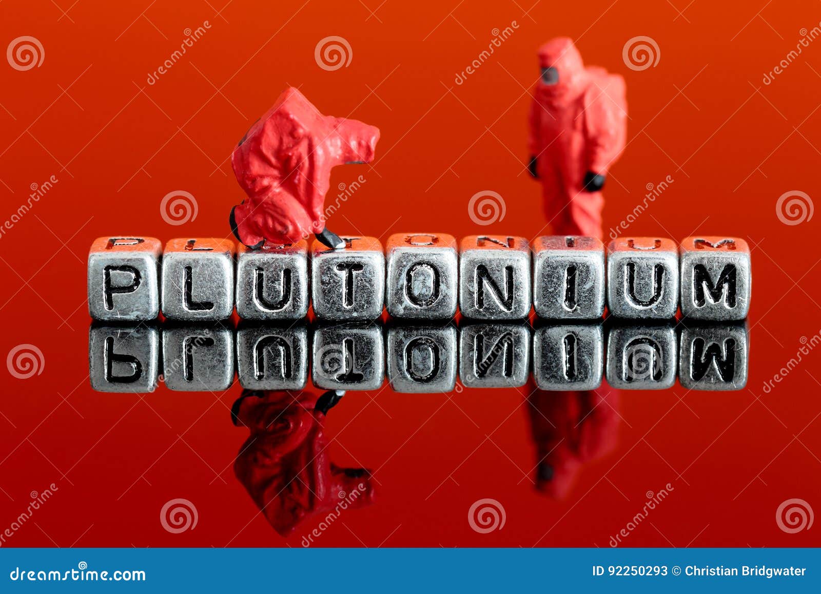 Model Team in Chemical Suits with the Word Plutonium on Beads Stock ...