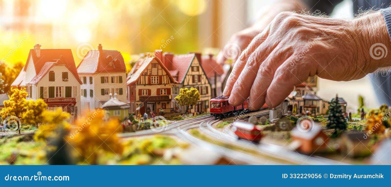 A Model Train is Carefully Arranged on a Miniature Landscape Setup ...