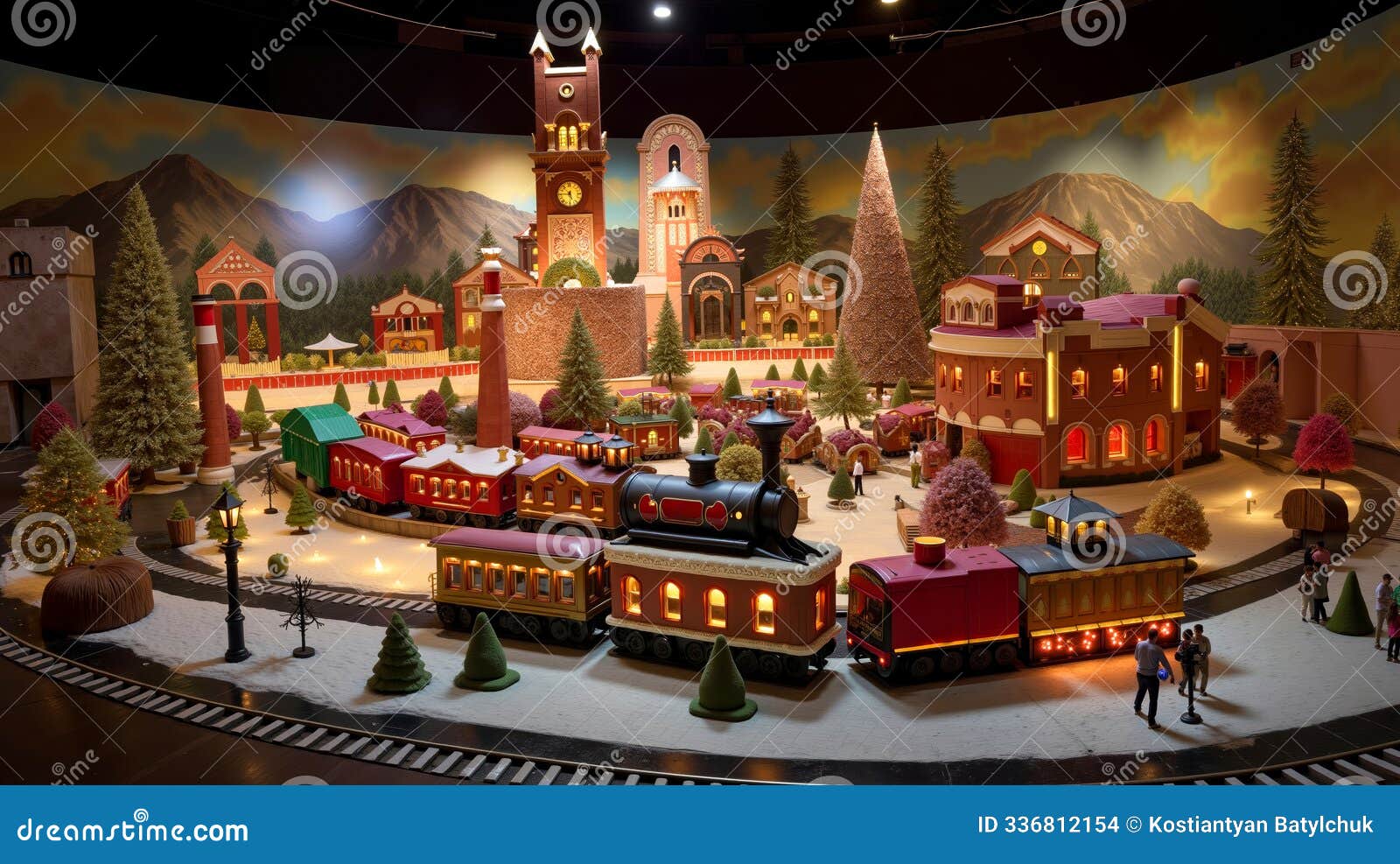 A Model Train Set Up in a Large Room with a Clock Tower Stock Photo ...