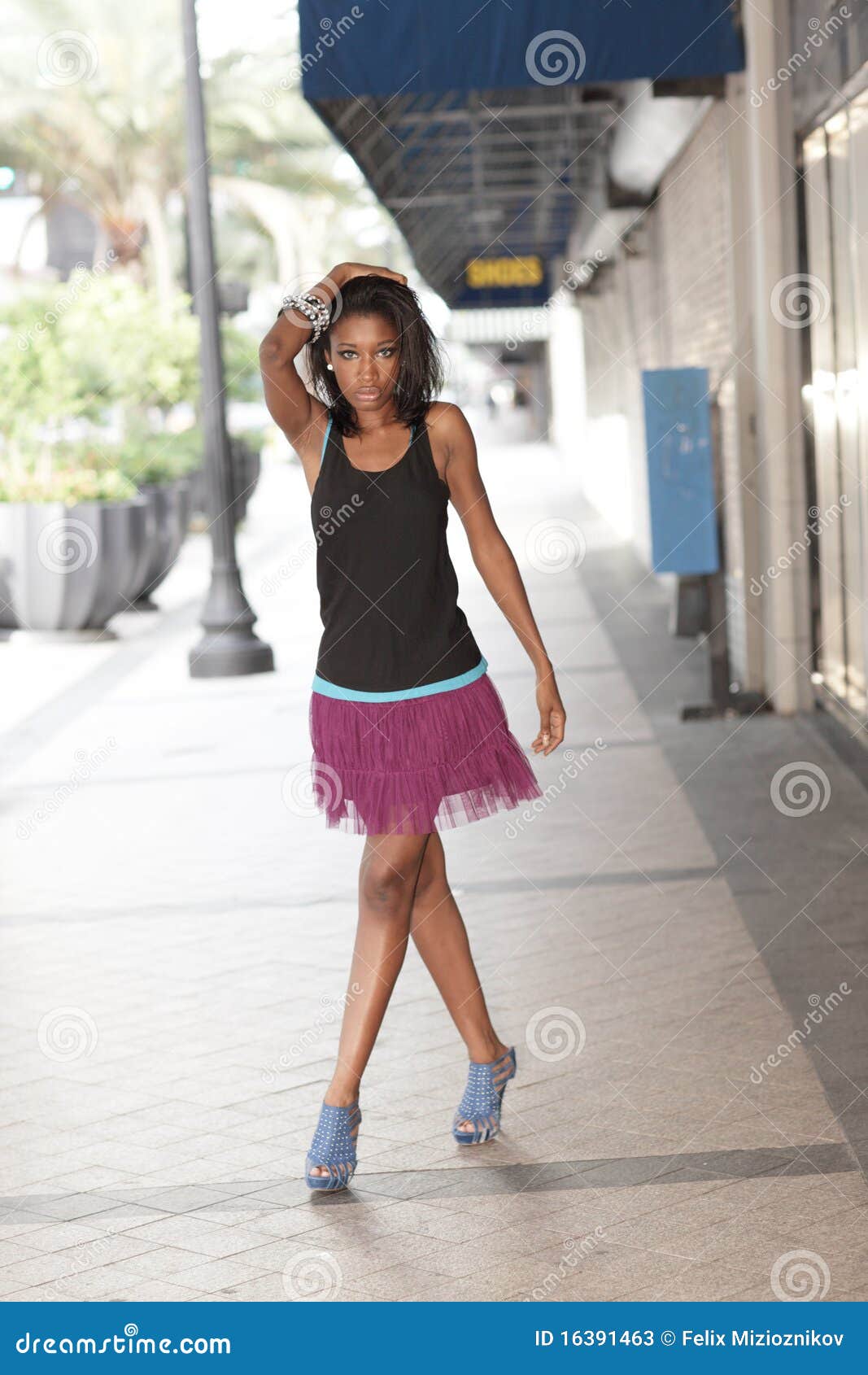 Model Walking Down the Street Stock Image - Image of stylish, outdoors ...
