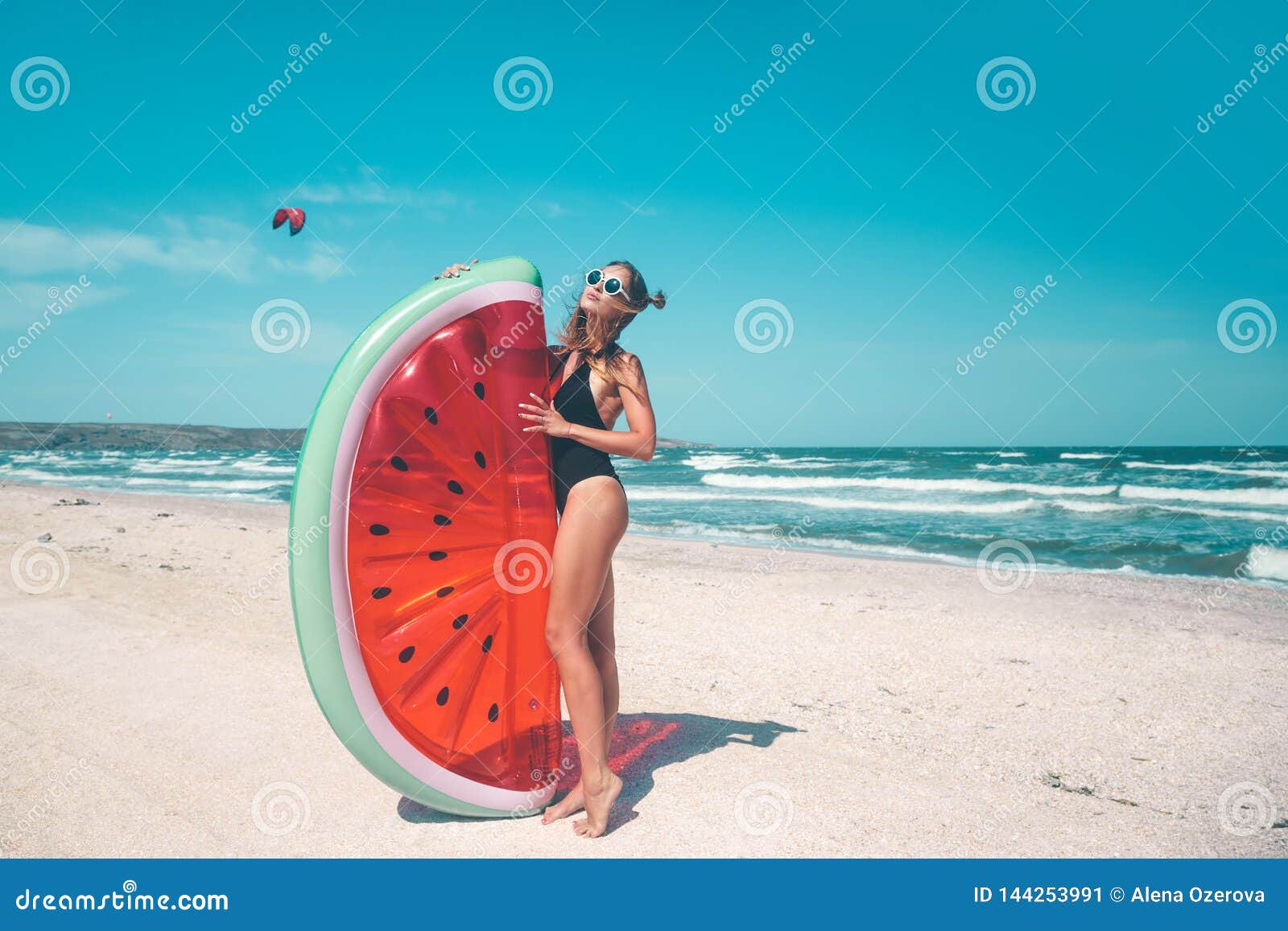 Model With Watermelon Lilo At The Beach Stock Image Image Of Legs