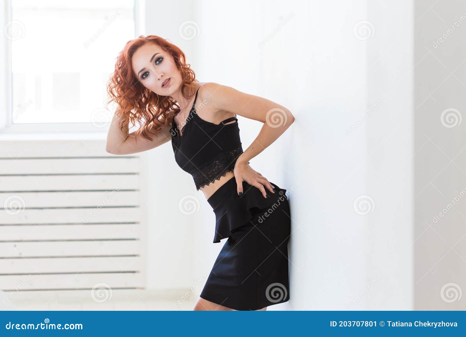 Modeling, People Concept - Attractive Young Woman Posing by the Wall ...