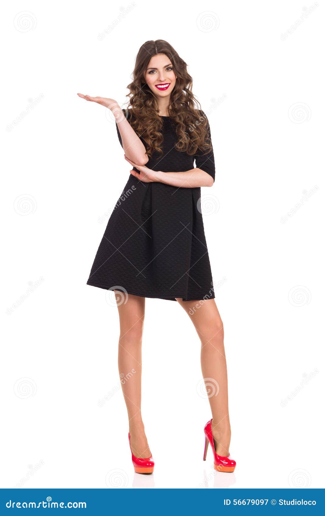 Modelo De Moda En Mini Dress Presenting Product Negro Imagen de archivo ...