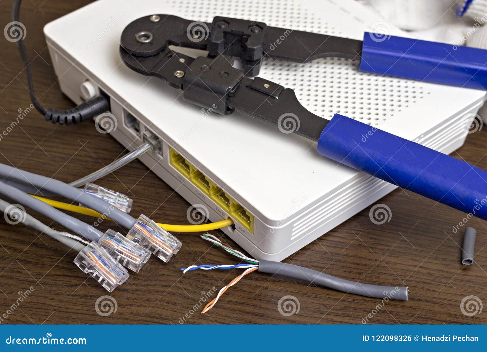 Modem, Network Cable and Crimper for Crimping Chips Modem Stock Photo ...