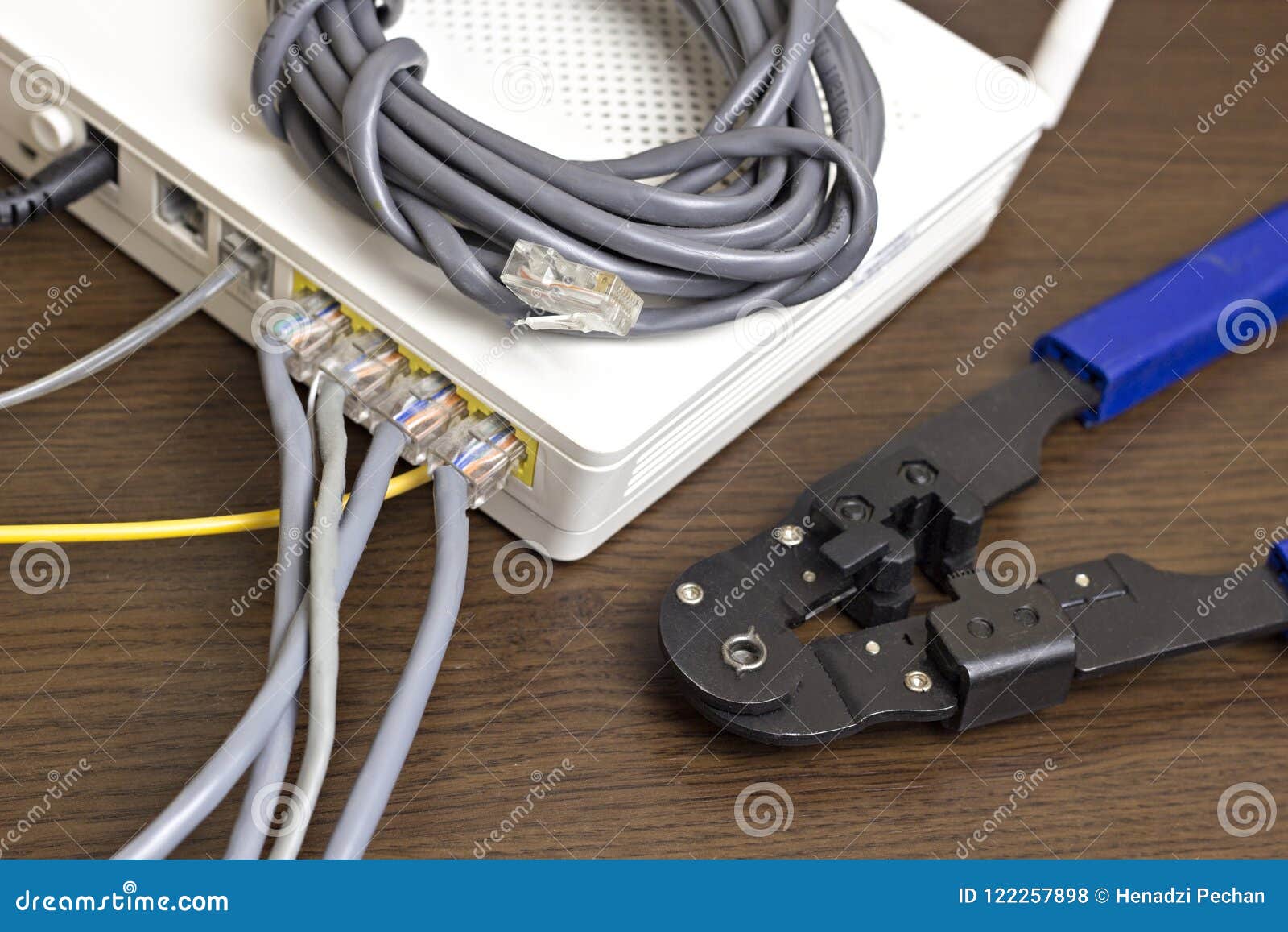 Modem, Network Cable and Crimper for Crimping Chips Stock Photo - Image ...