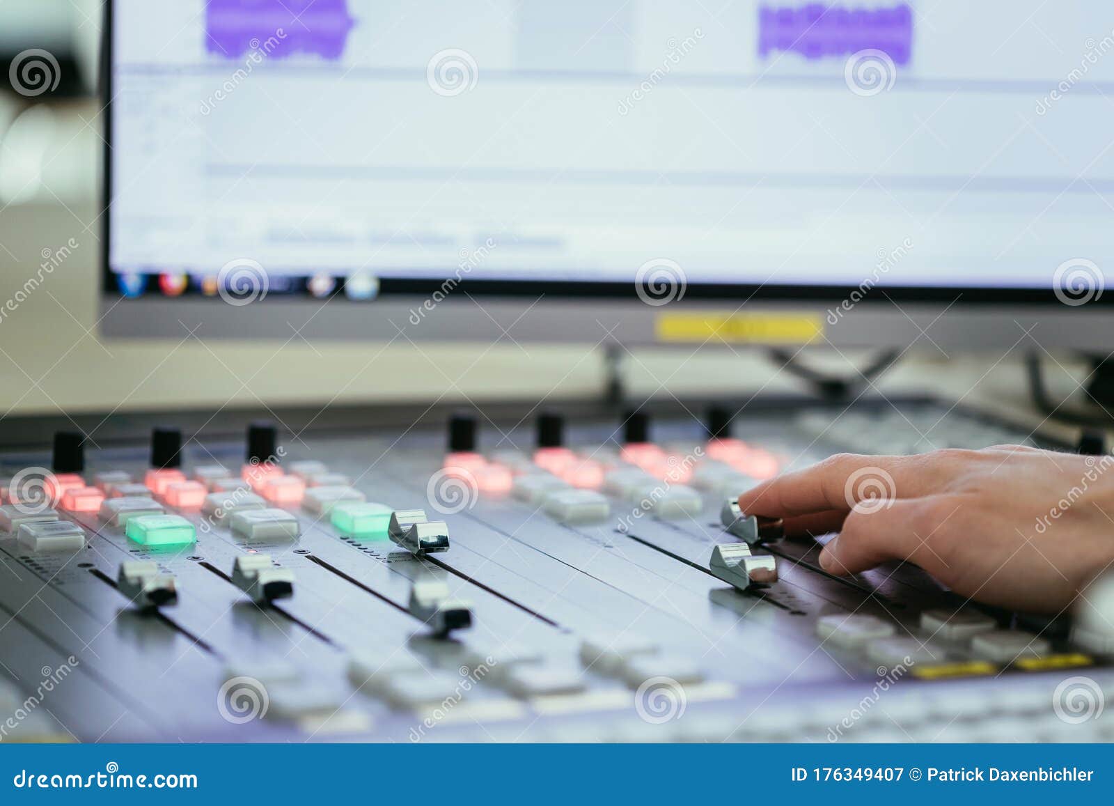 Radio Broadcasting Studio: Moderator is Using the Soundboard, Computer ...