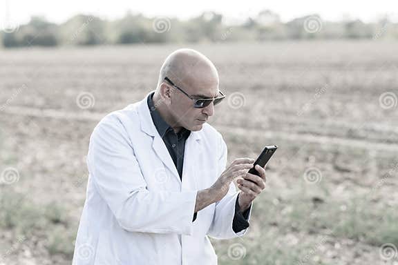 Agronomist at work editorial photography. Image of agronomist - 126008302