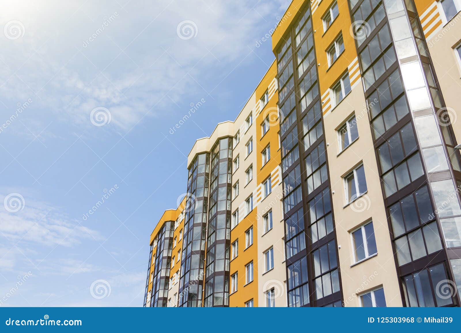 Modern Apartment Building in Sunny Day Against Blue Sky. Stock Photo ...