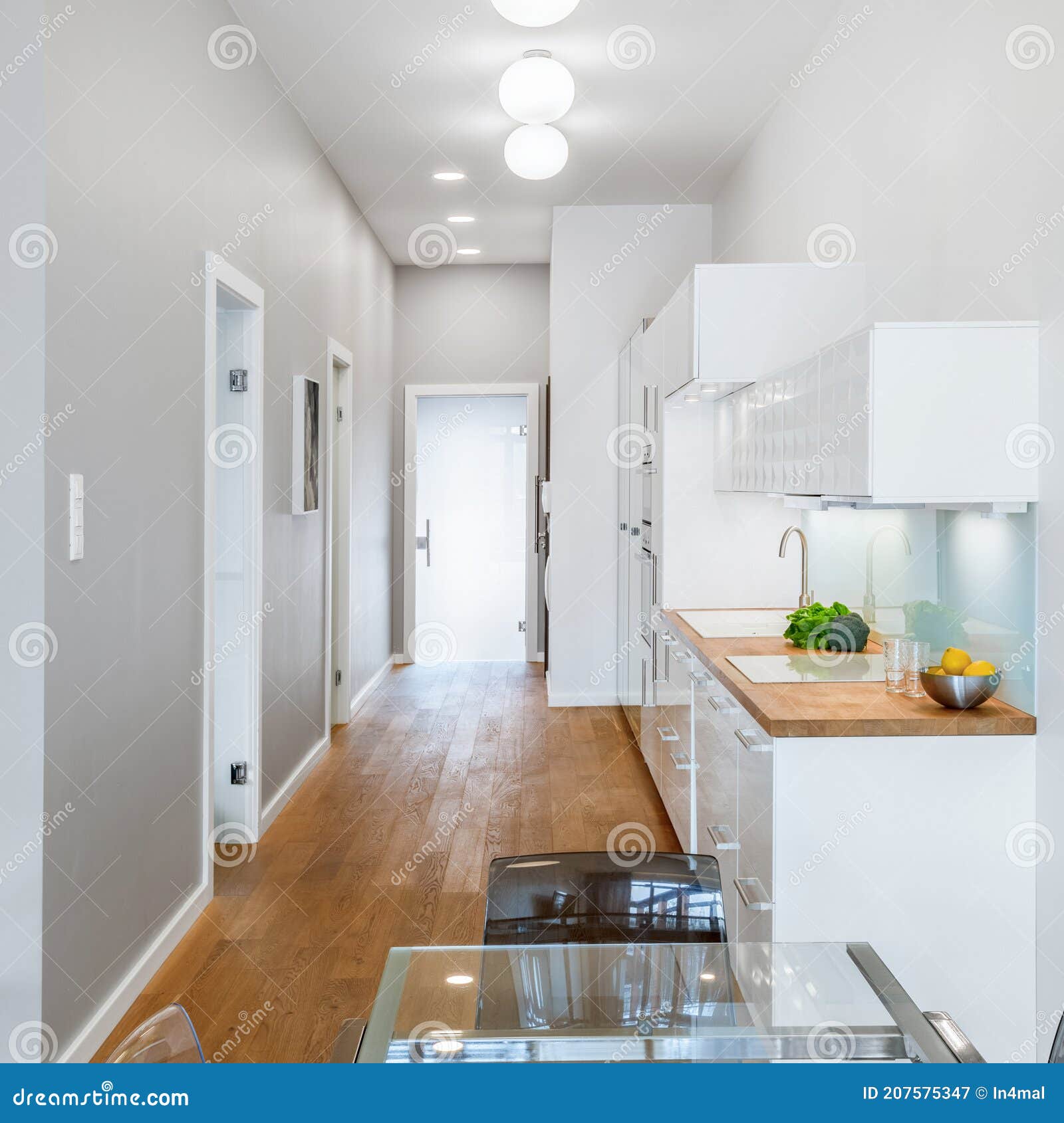 Kitchen area in corridor stock image. Image of design - 207575347
