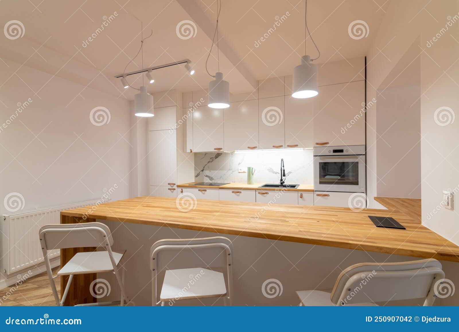 Modern Apartment Kitchen with a Counte Stock Photo - Image of table ...
