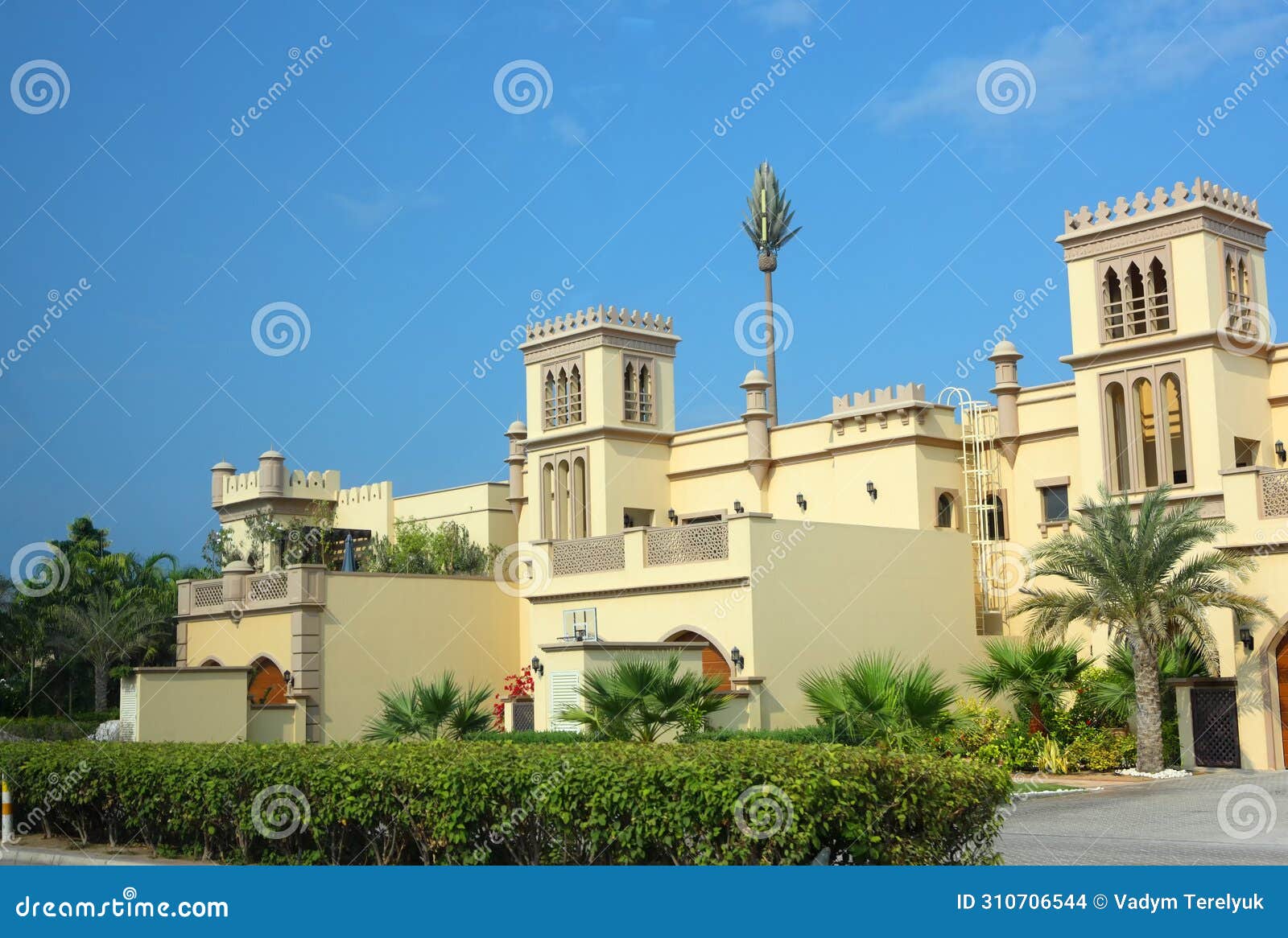 Modern Arabic Style Building. View of the Building with Palm Trees from ...