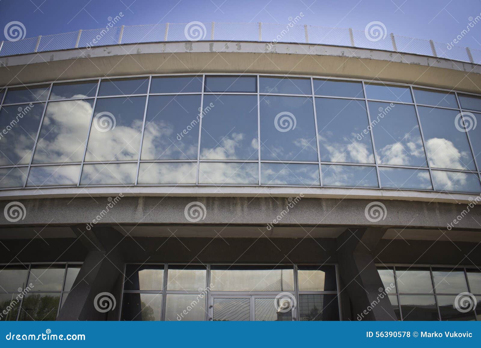 Modern Arc Facade with Reflective Glasses Stock Photo - Image of glass ...