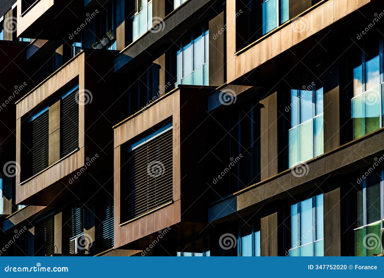 Modern Architectural Facade with Geometric Protrusions and Reflective ...