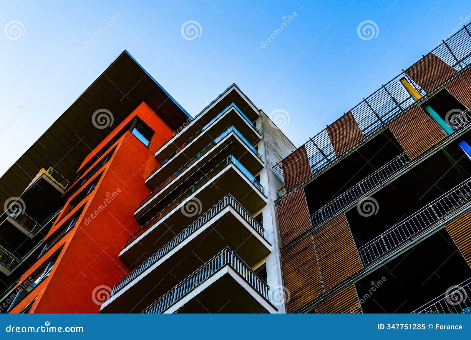 Modern Architectural Facade with Geometric Protrusions and Reflective ...