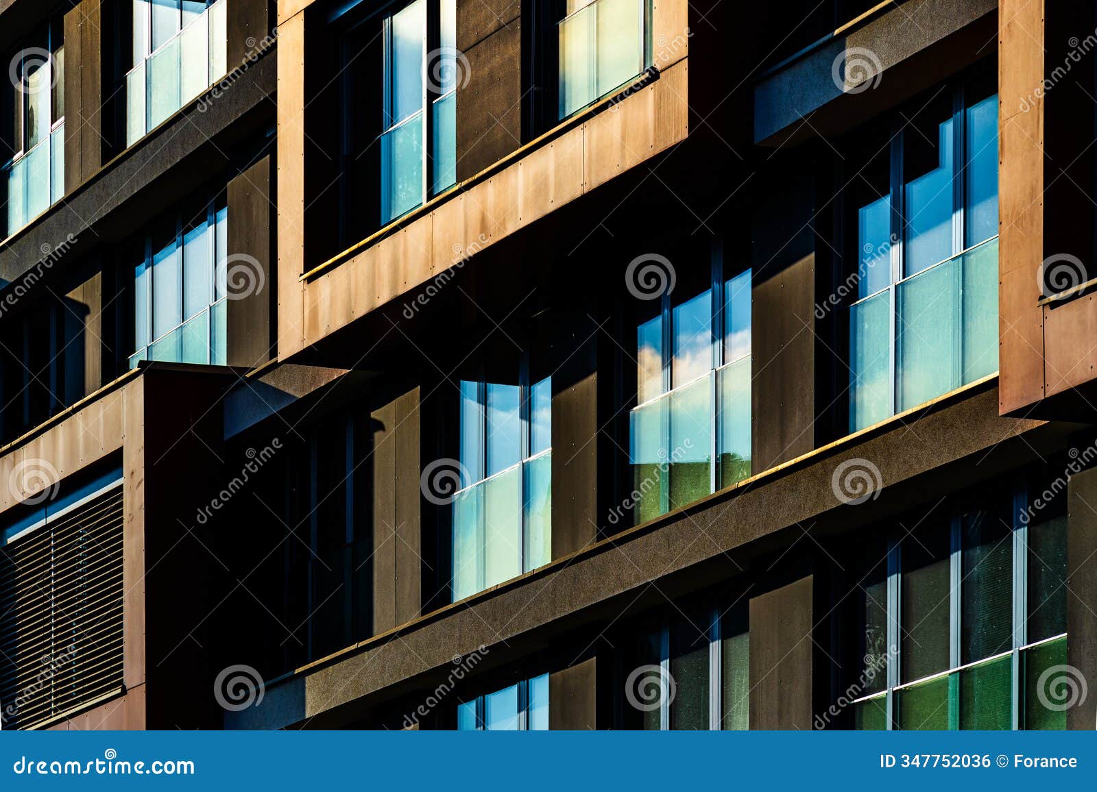 Modern Architectural Facade with Geometric Protrusions and Reflective ...