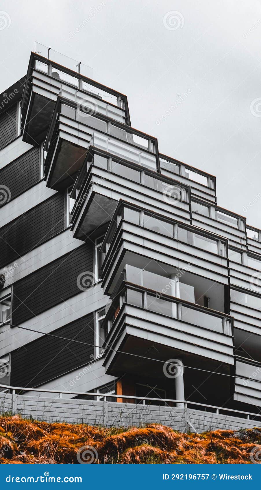 Modern Architectural Structure Features a Top Floor with Striking Black ...