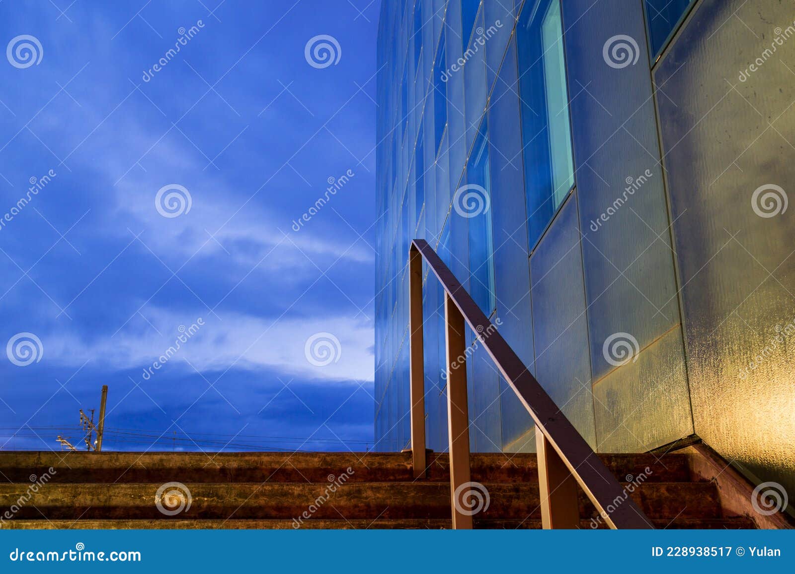 Modern Architecture in Cold Blue Light of Twilight Hour and Warm Light ...