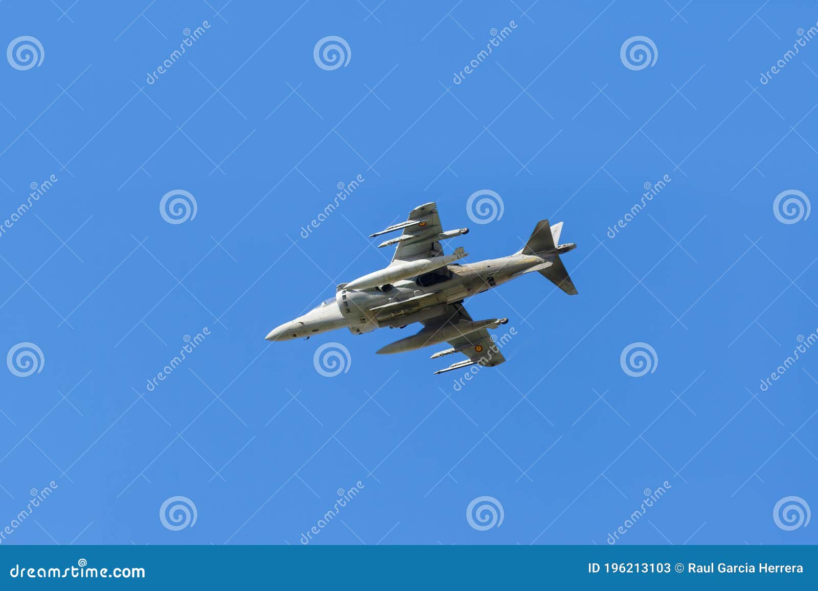 Modern Armed Military Fighter Jet Flys in Formation through the Sky ...