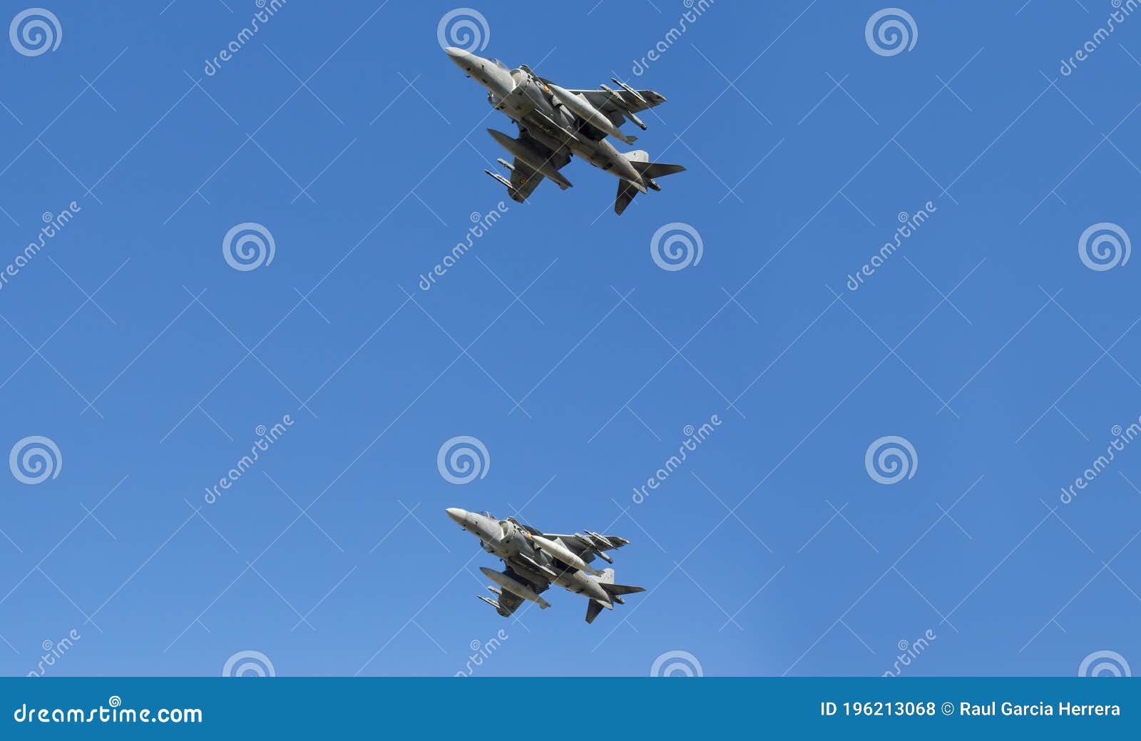 Modern Armed Military Fighter Jets Flys in Formation through the Sky ...