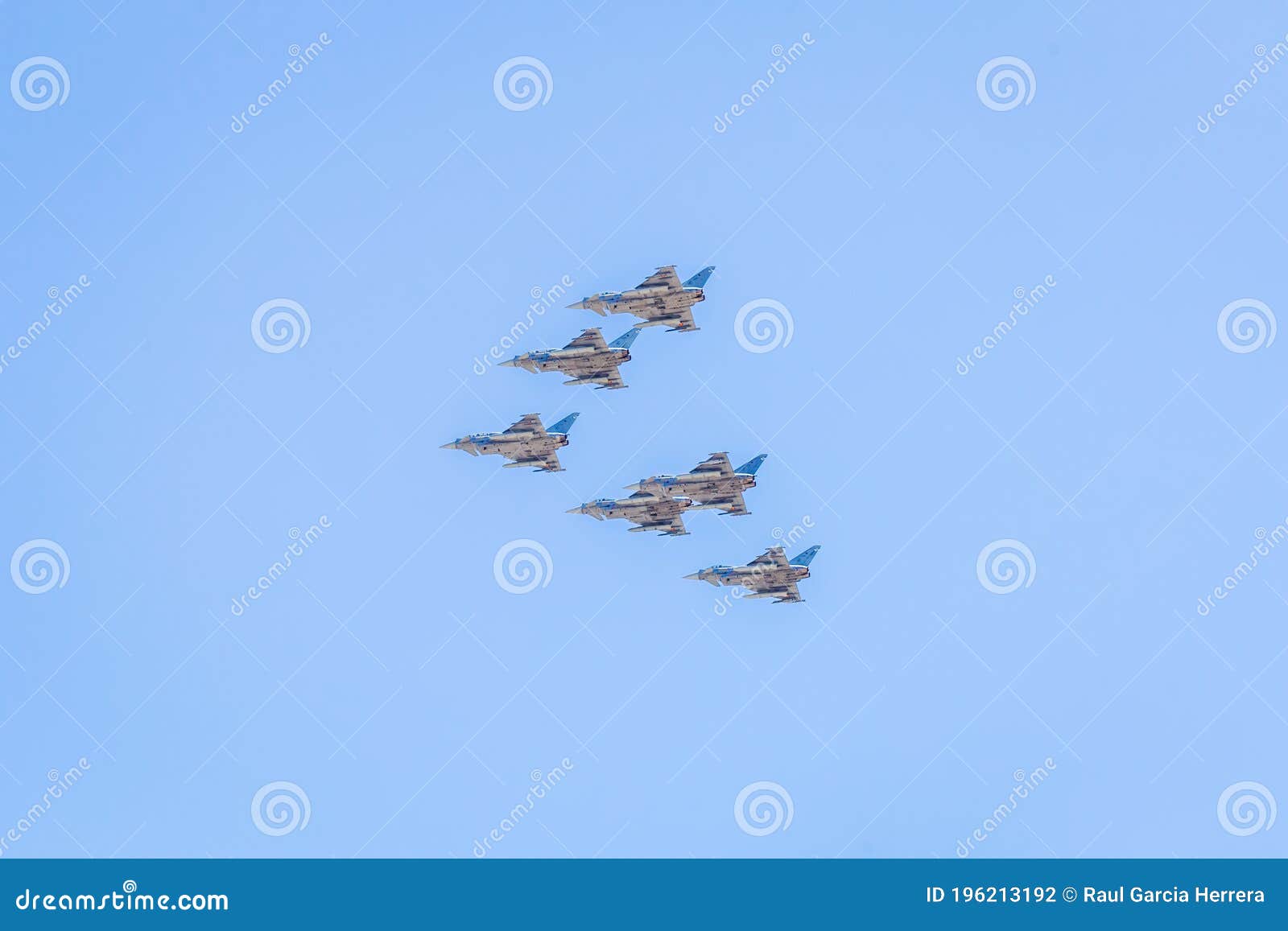 Modern Armed Military Fighter Jets Flys in Formation through the Sky ...