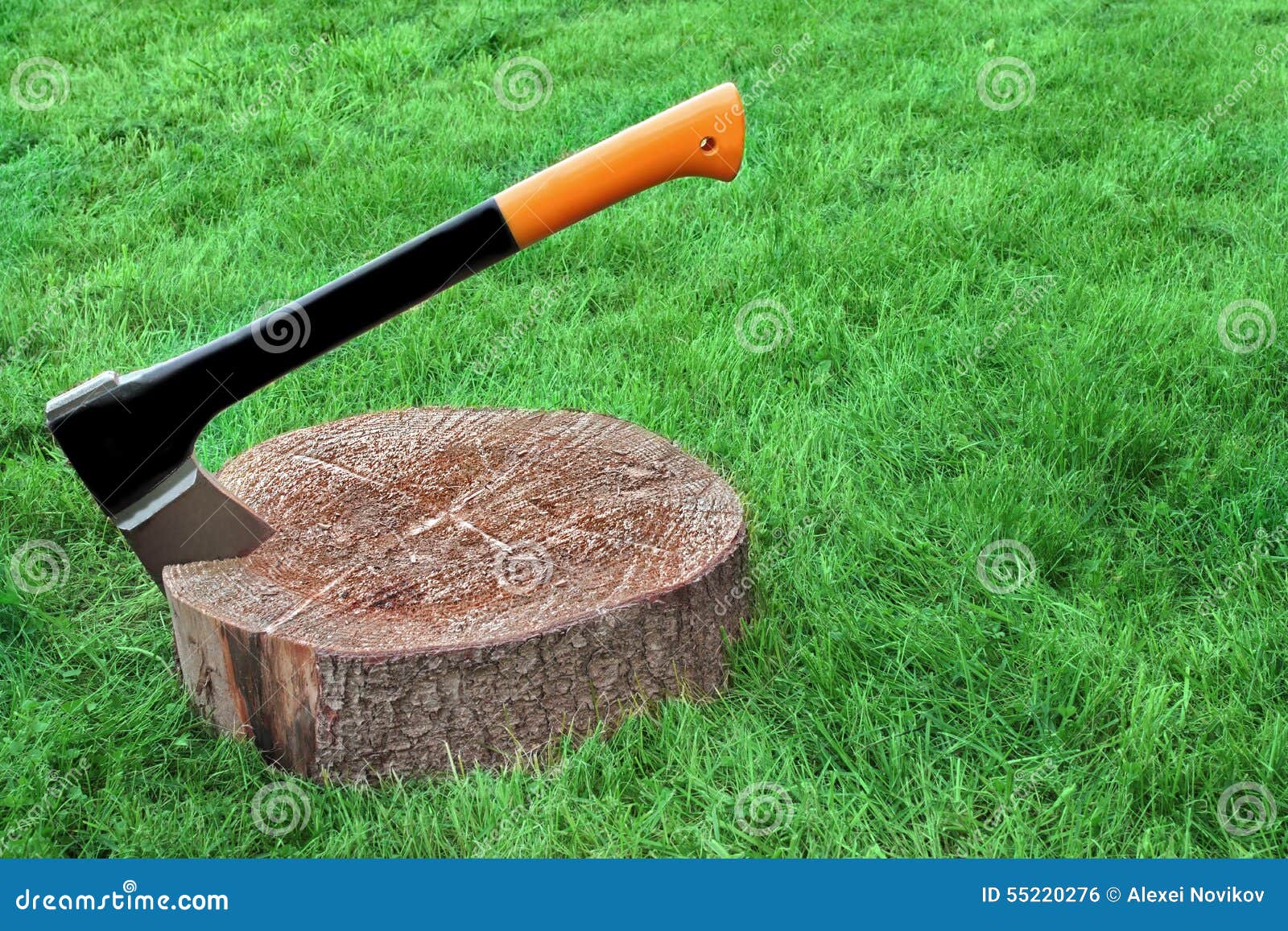 Modern Axe Set in Chopping Block Grass on the Background Stock Photo ...