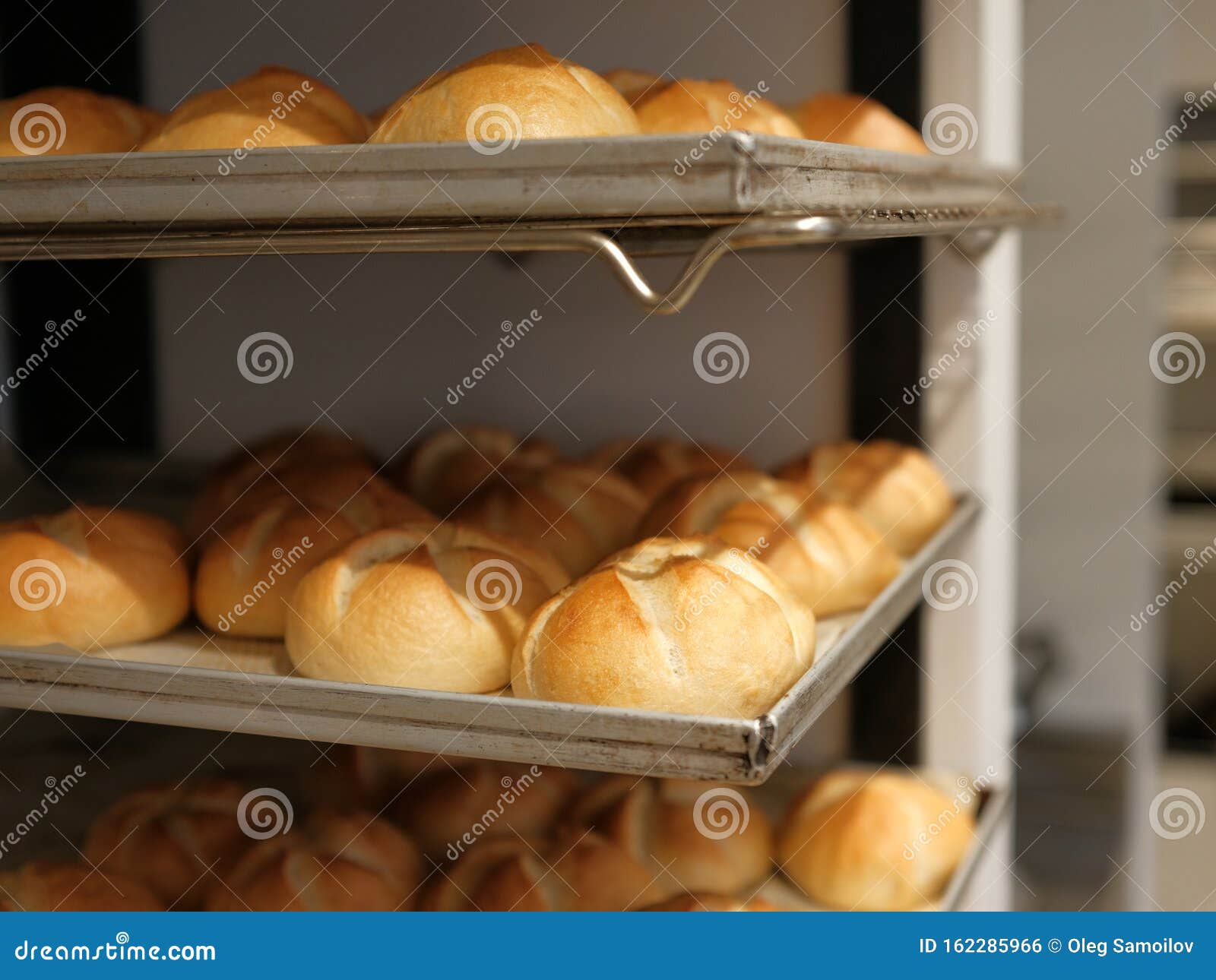 Modern Bakery with Different Kinds of Bread, Cakes and Buns Stock Photo ...