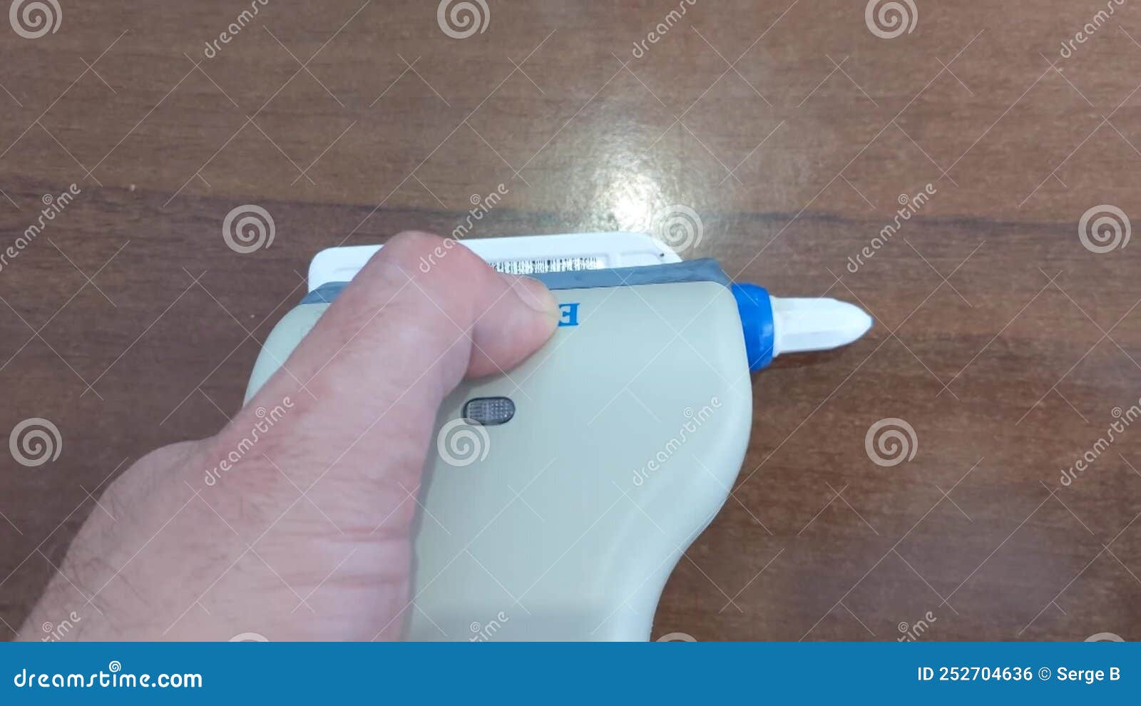 A Modern Bar Code Scanner for Commerce. Working with the Scanner Stock ...