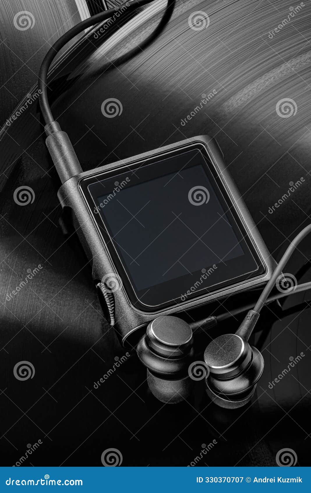 Modern Black MP3 Music Player with Empty Screen on Vinyl Records with ...