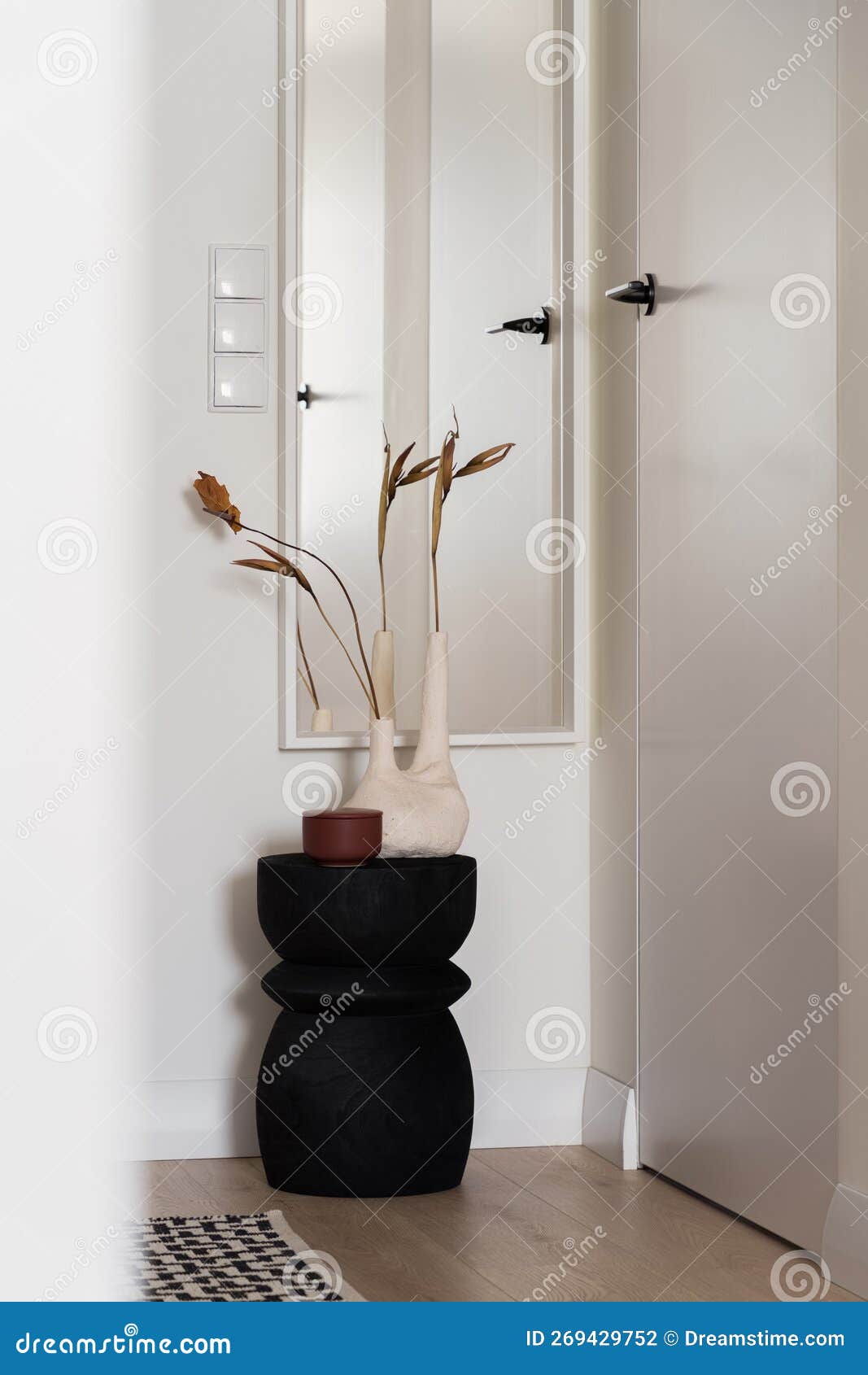 Black Side Table with Decorations in Corridor Stock Photo - Image of ...