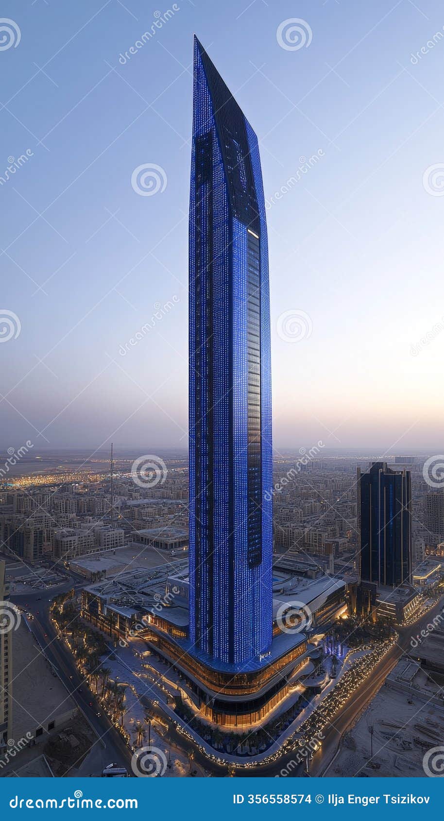 Modern, Blue Glass Skyscraper Piercing the Twilight Sky in Riyadh ...