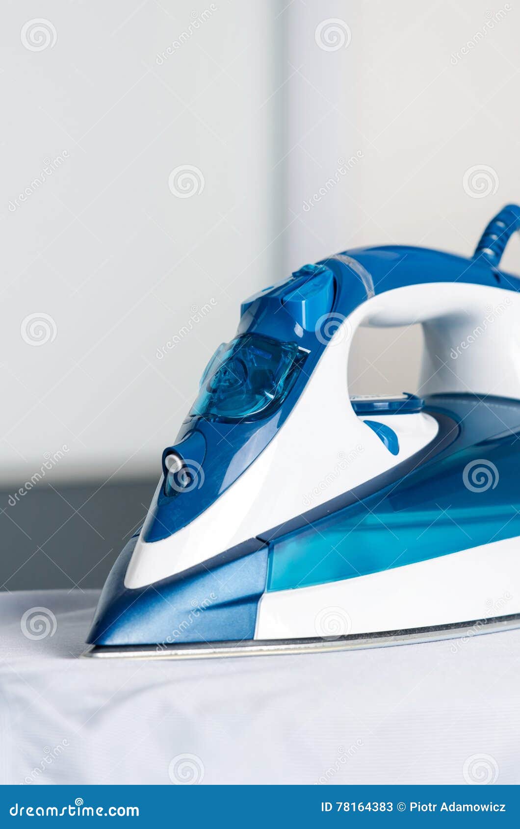 Modern Blue Steam Iron on Ironing Board Stock Image - Image of ...