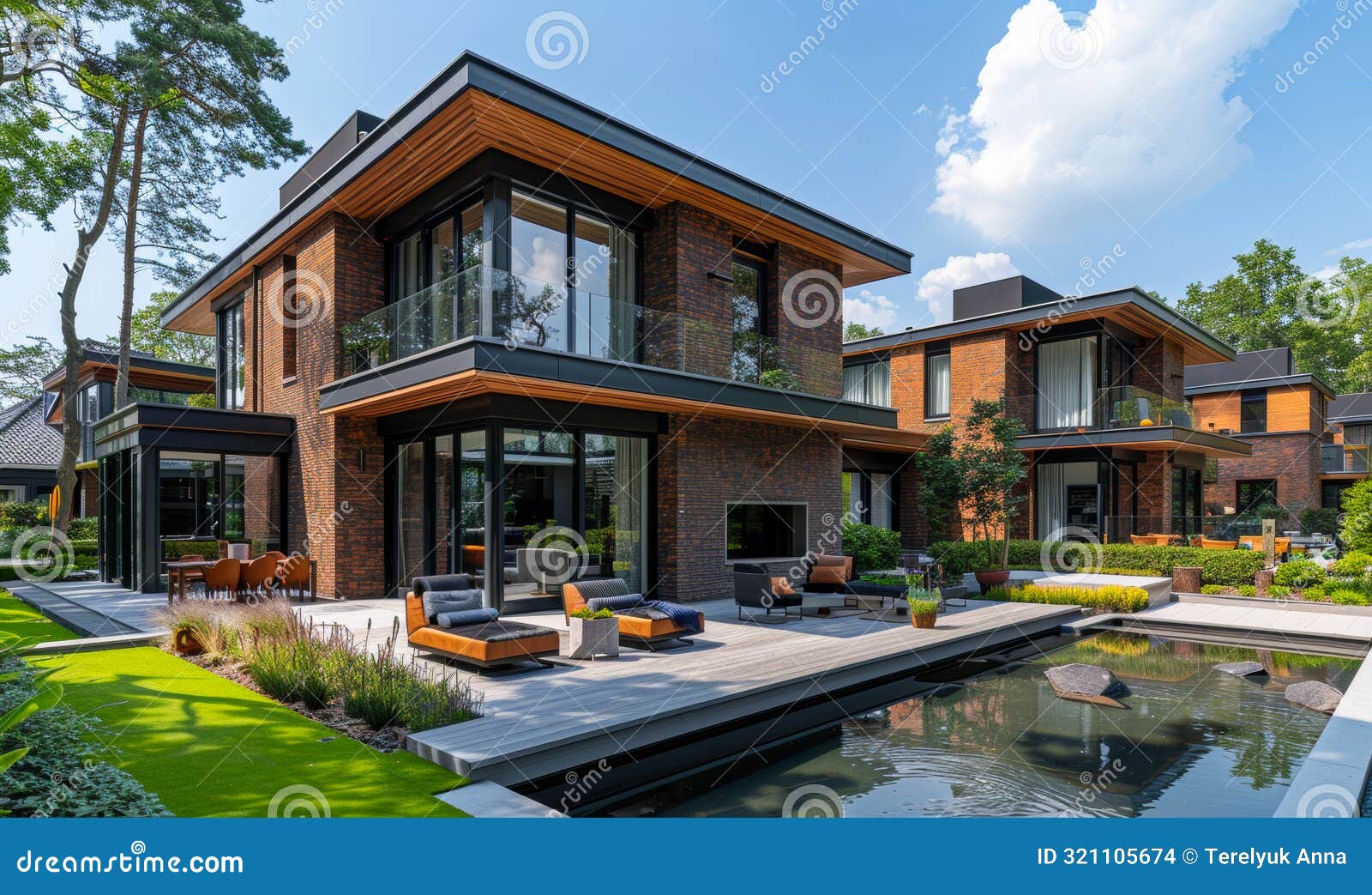 Modern Brick House with Large Garden and Pond Stock Photo - Image of ...