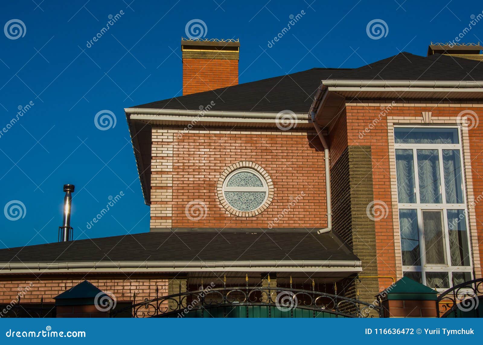 Modern Brick House with Round and Rectangular Windows Stock Photo ...