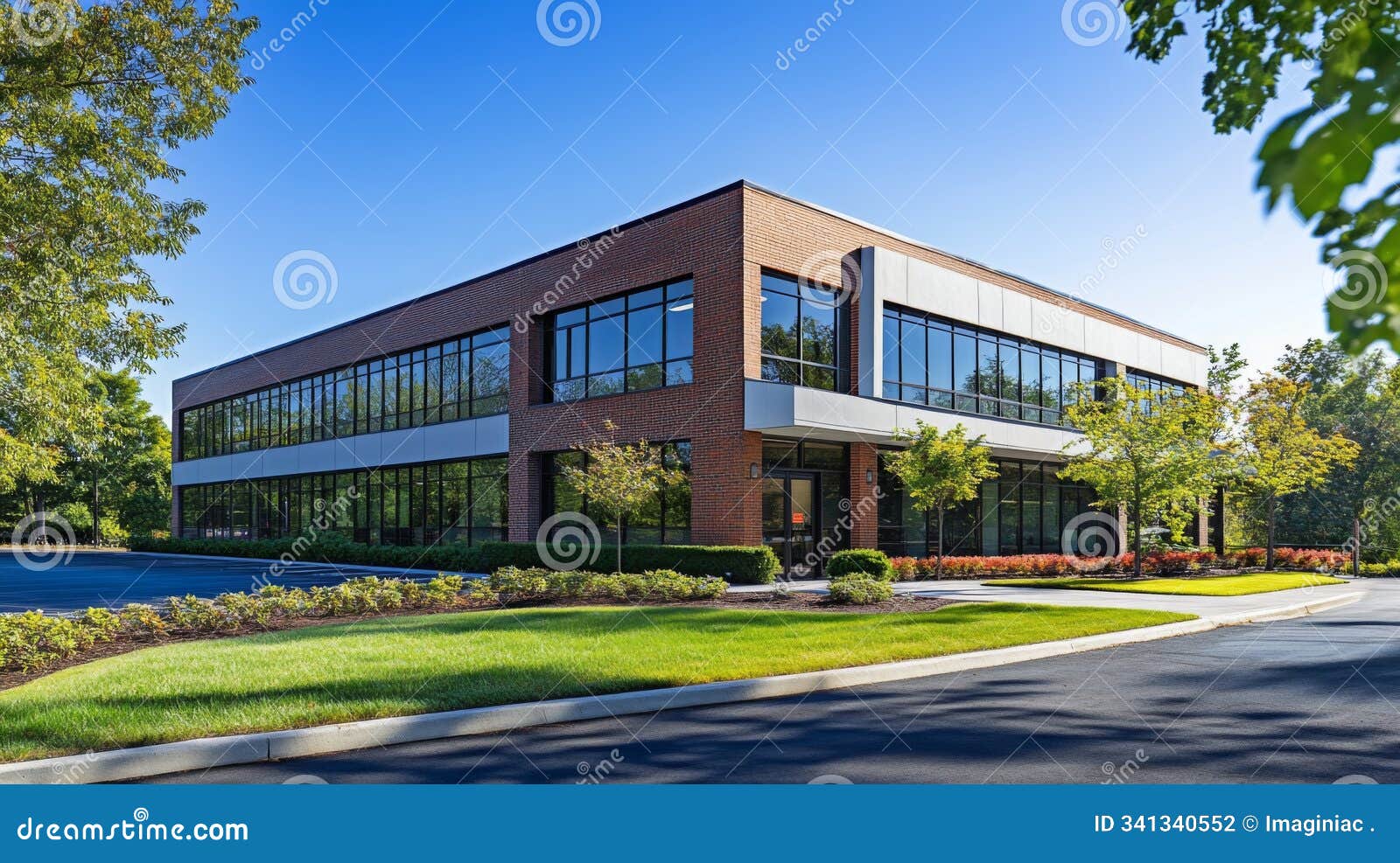 Modern Brick Office Building with Large Windows and Green Landscaping ...