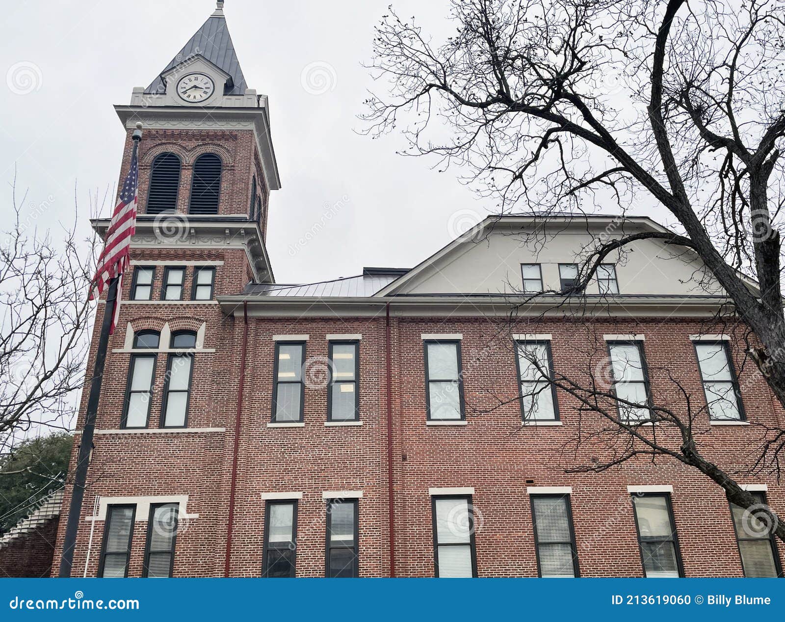 Modern Brick Partial Building with an American Flag Stock Photo - Image ...