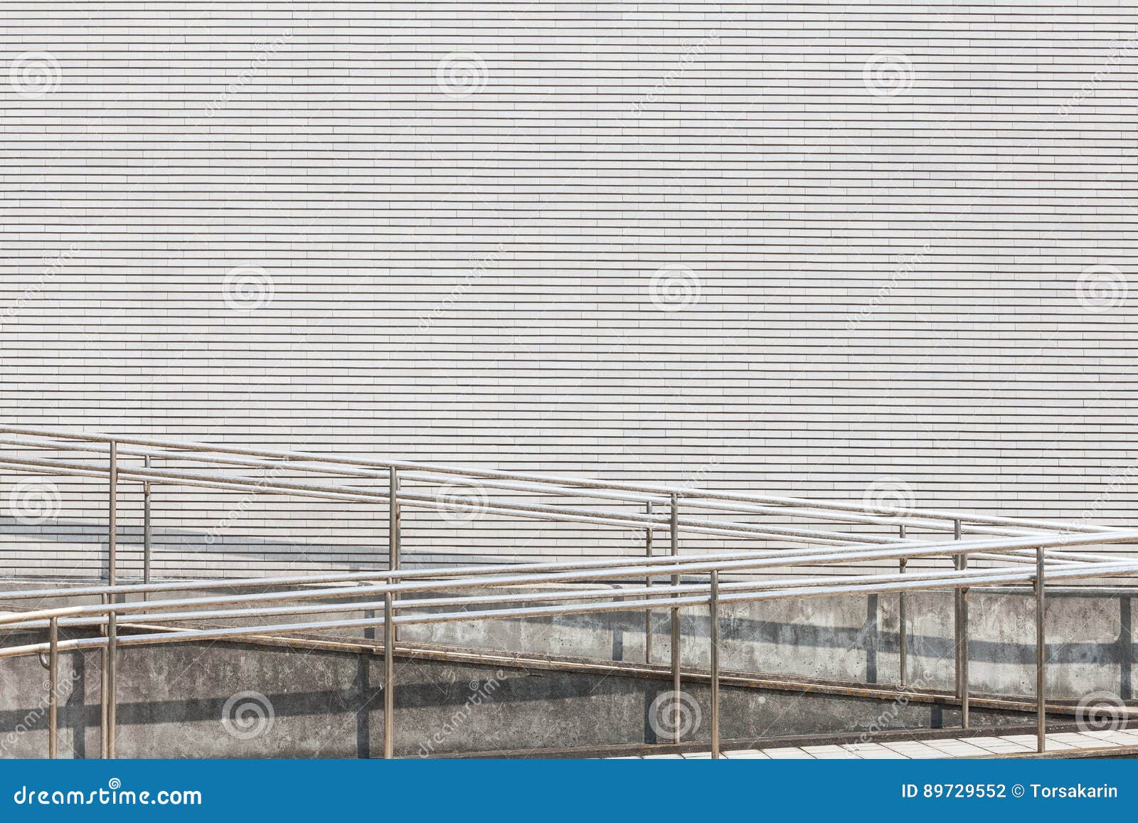 Ramp For Wheelchairs And Glass Elevator On A Multistory House Facade ...