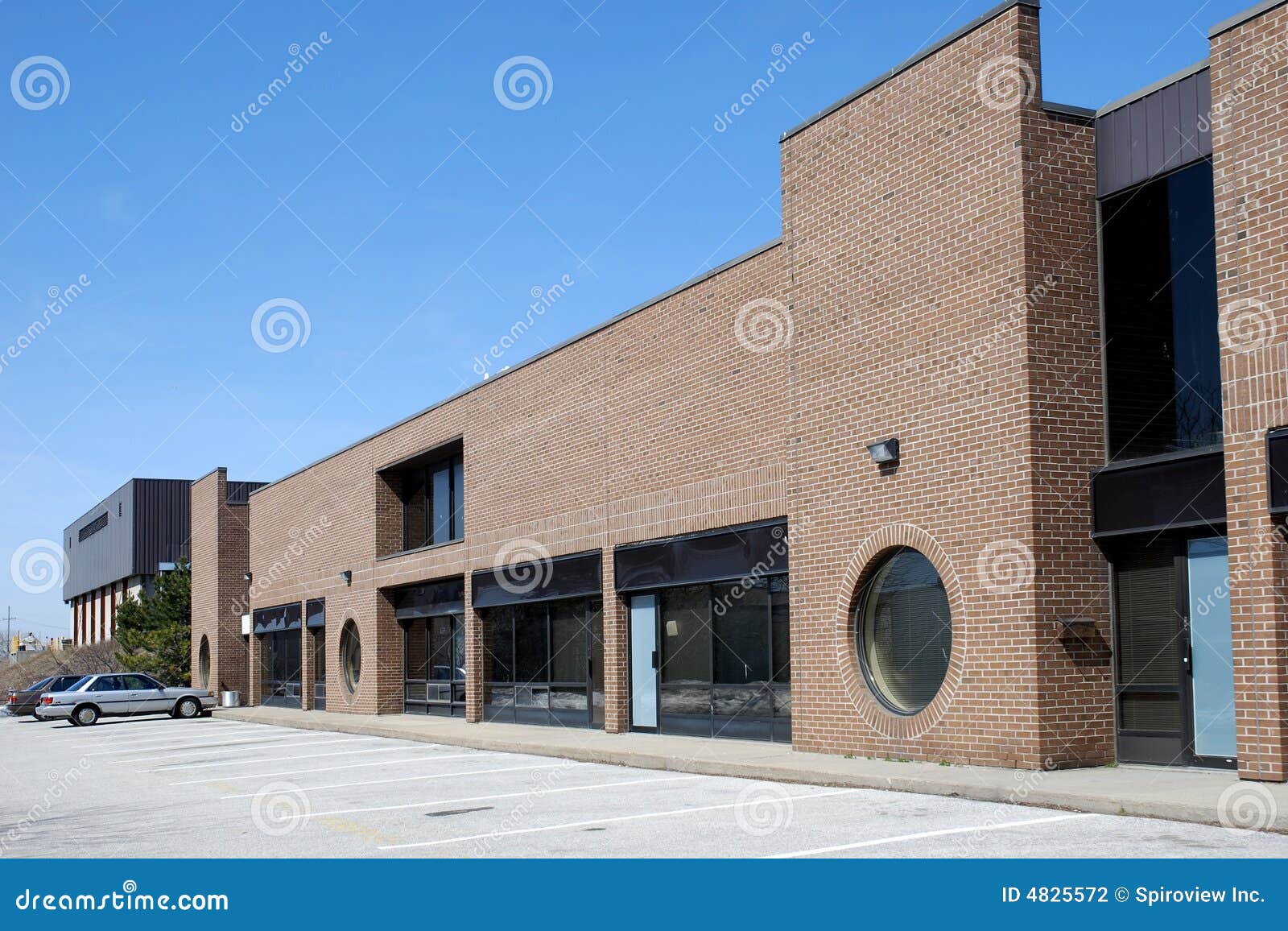 Modern brick warehouse stock photo. Image of window, door - 4825572