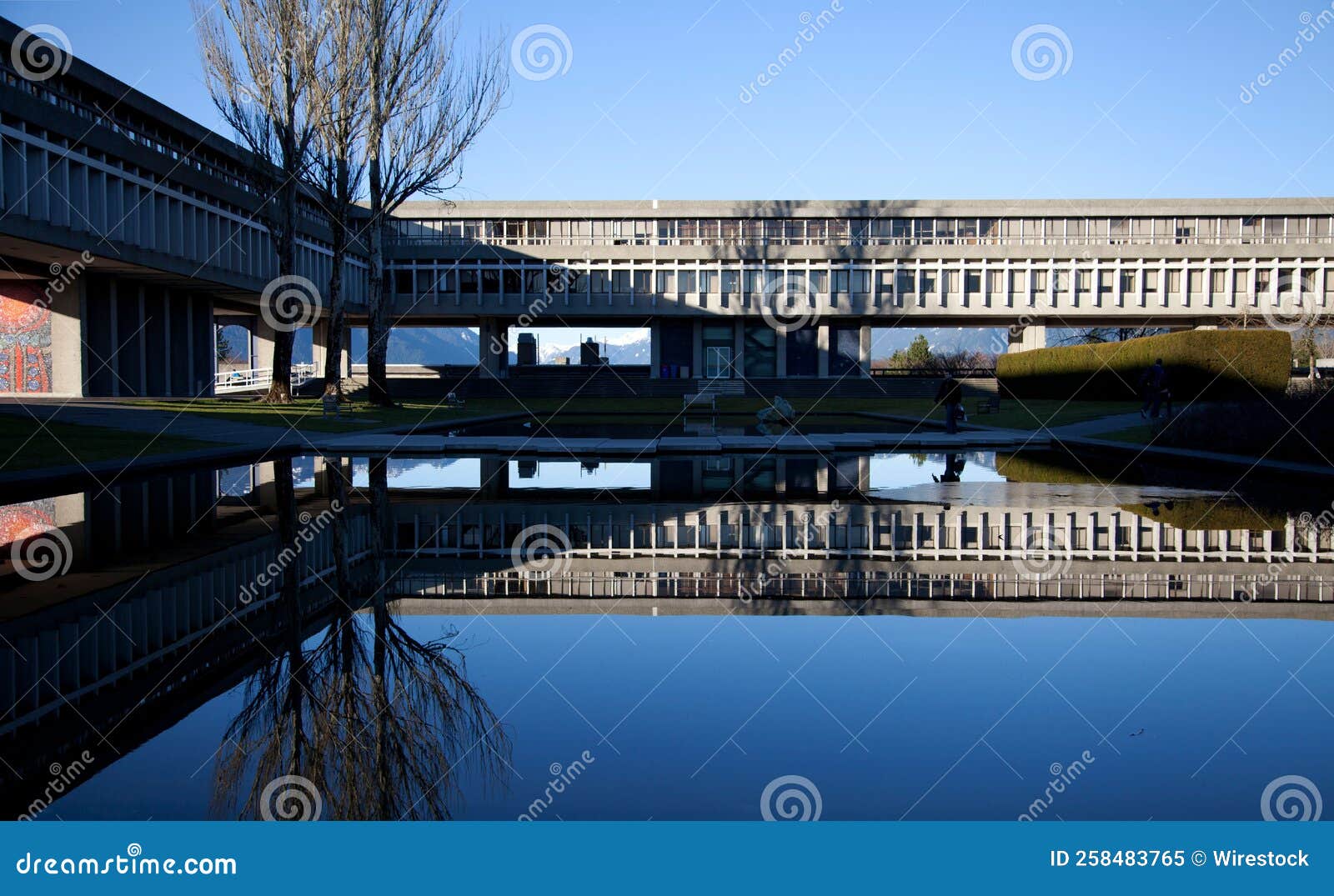 Modern Bridge Building Reflected on the Water Surface. Simon Fraser ...