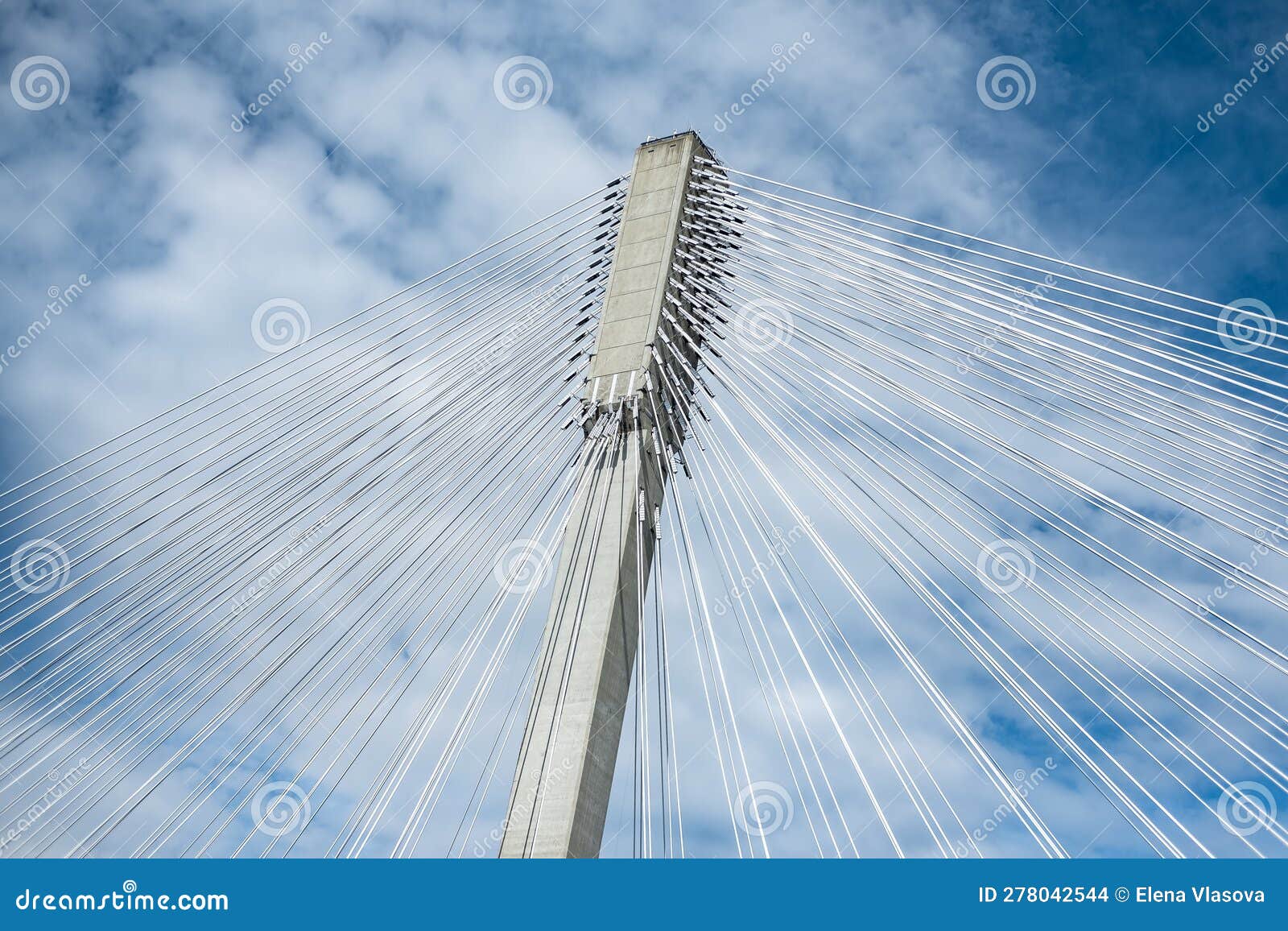 Modern Bridge Pylon Against Blue Sky. Multi-span Cable-stayed Bridge ...
