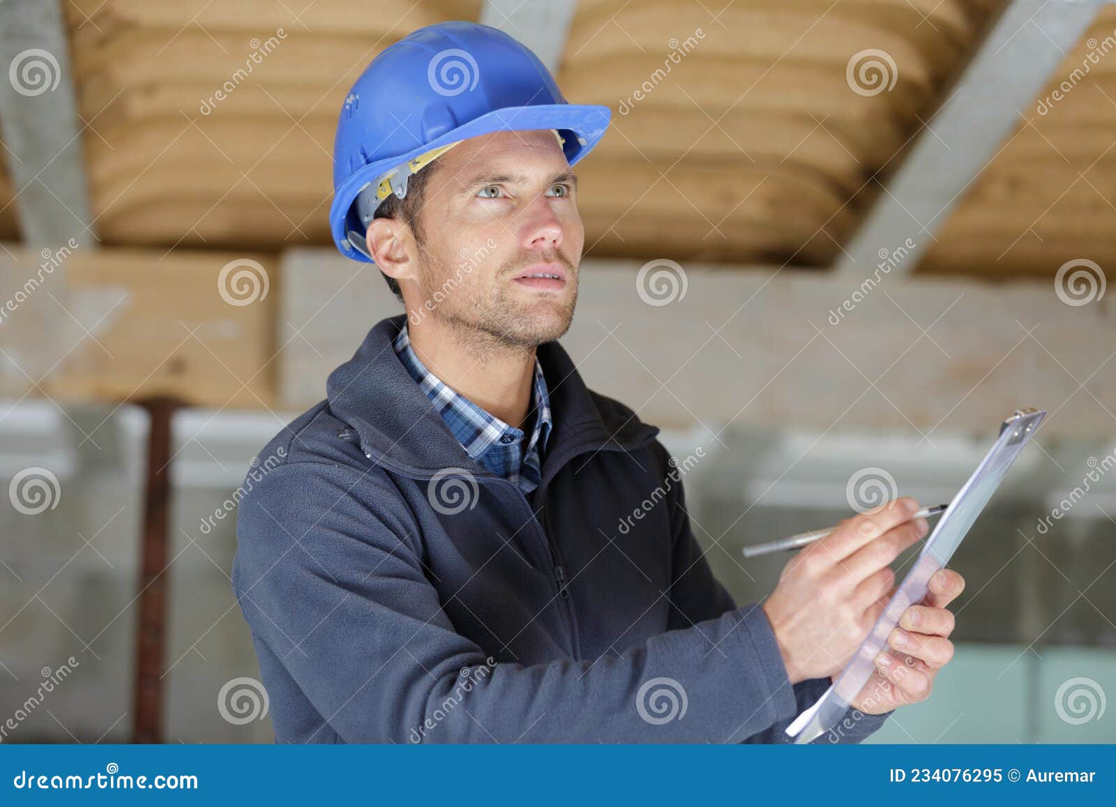 Modern Builder with Clipboard Taking Notes Stock Image - Image of paper ...