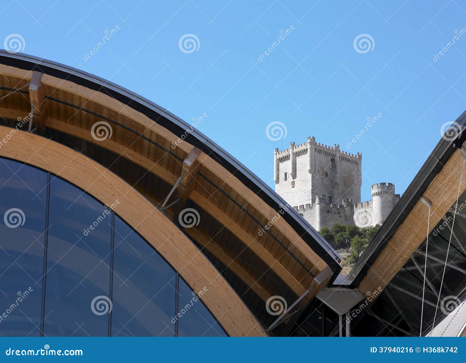 Modern Building Against Old Spanish Castle Stock Photo - Image of ...
