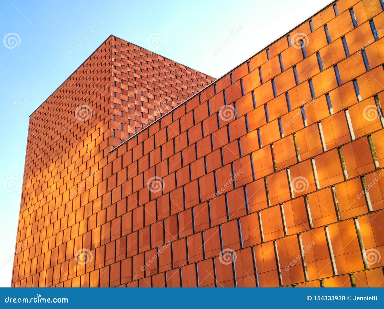 Modern Building Bright Orange Facade Made of Panels Stock Photo - Image ...