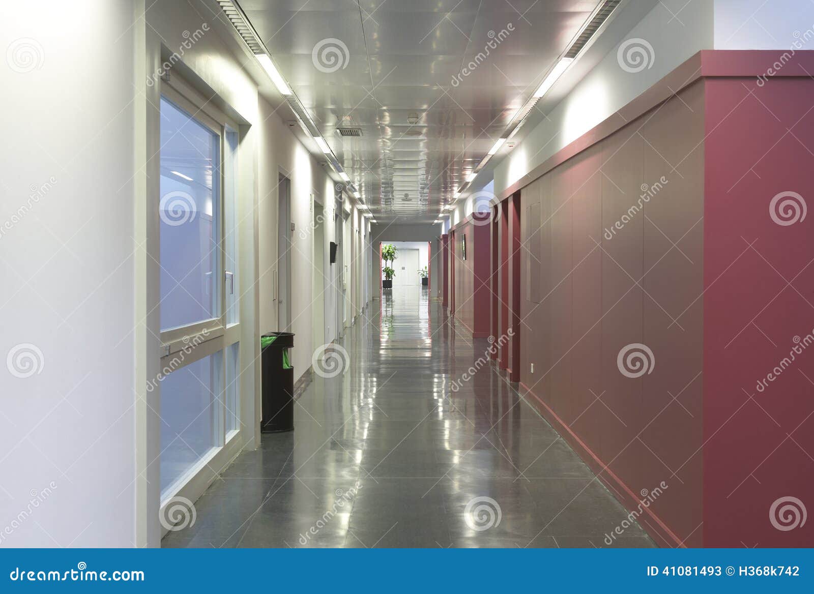 Modern Building Corridor with Red Wall Stock Image - Image of hallway ...
