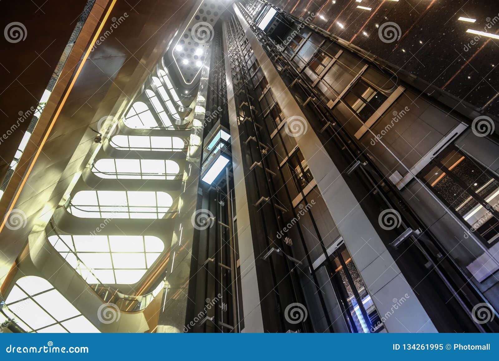 Modern Building Elevator Well Stock Image - Image of evening, four ...