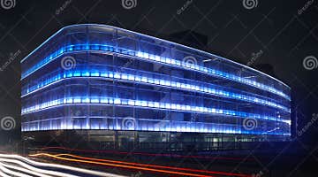 Modern Building Facade with Blue Light Stock Image - Image of town ...
