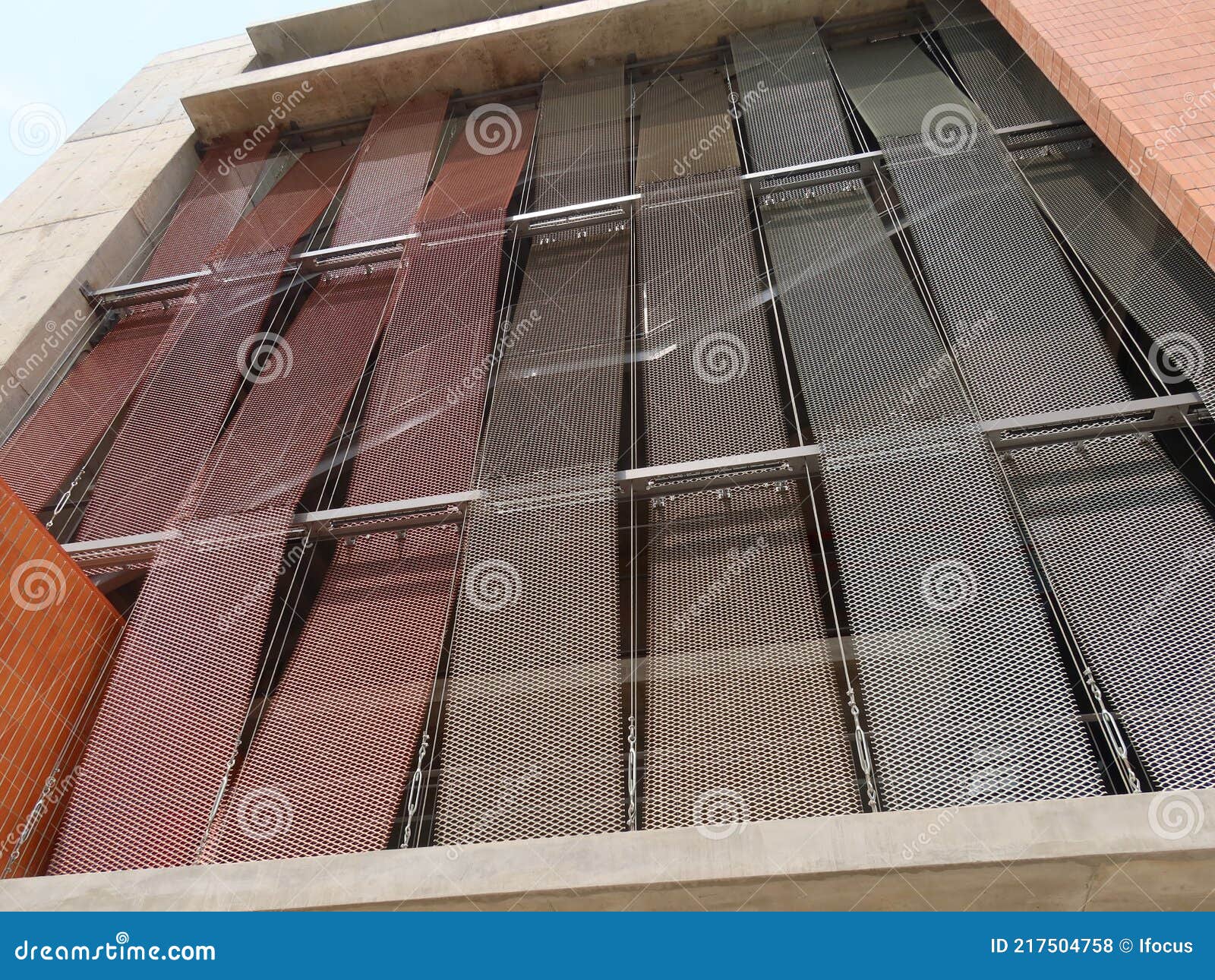 Modern Building Facade with Mesh Panels Stock Photo - Image of facade ...