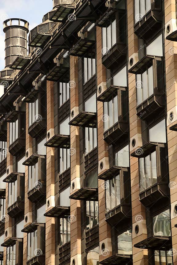 Modern Building Facade with Unique Windows in Urban Setting Stock ...
