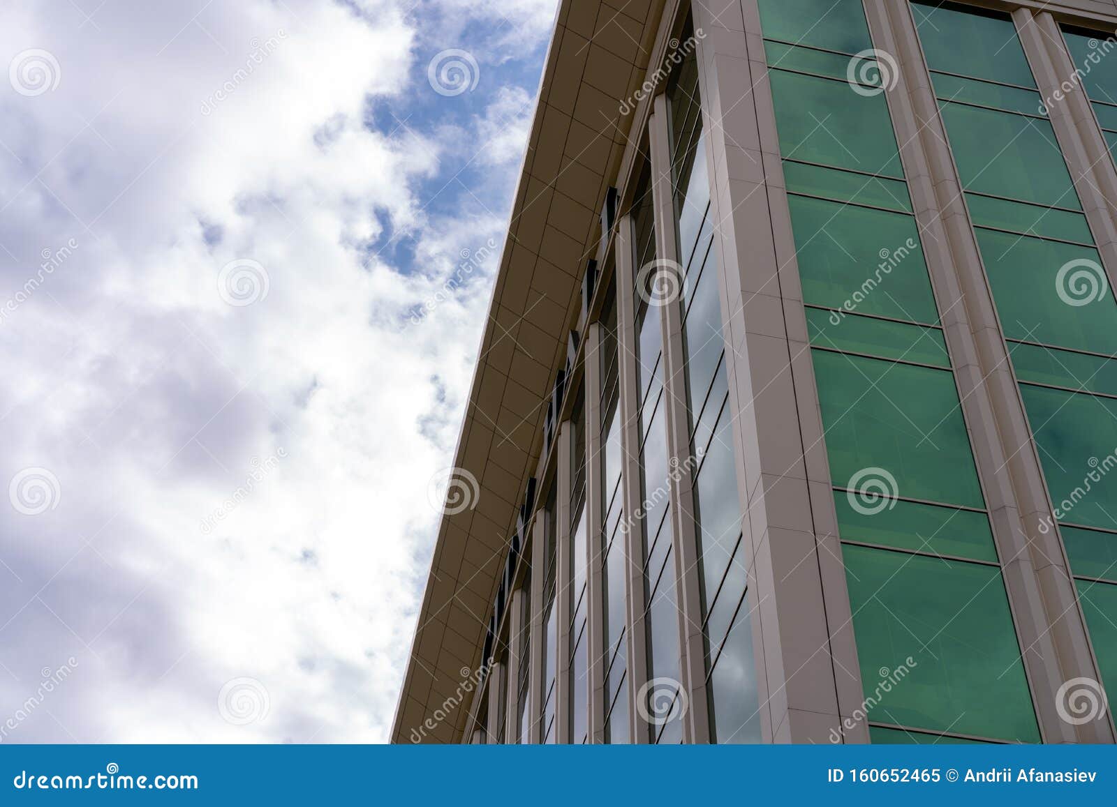 Modern Building Fragment with Cloudy Sky on the Background Stock Image ...