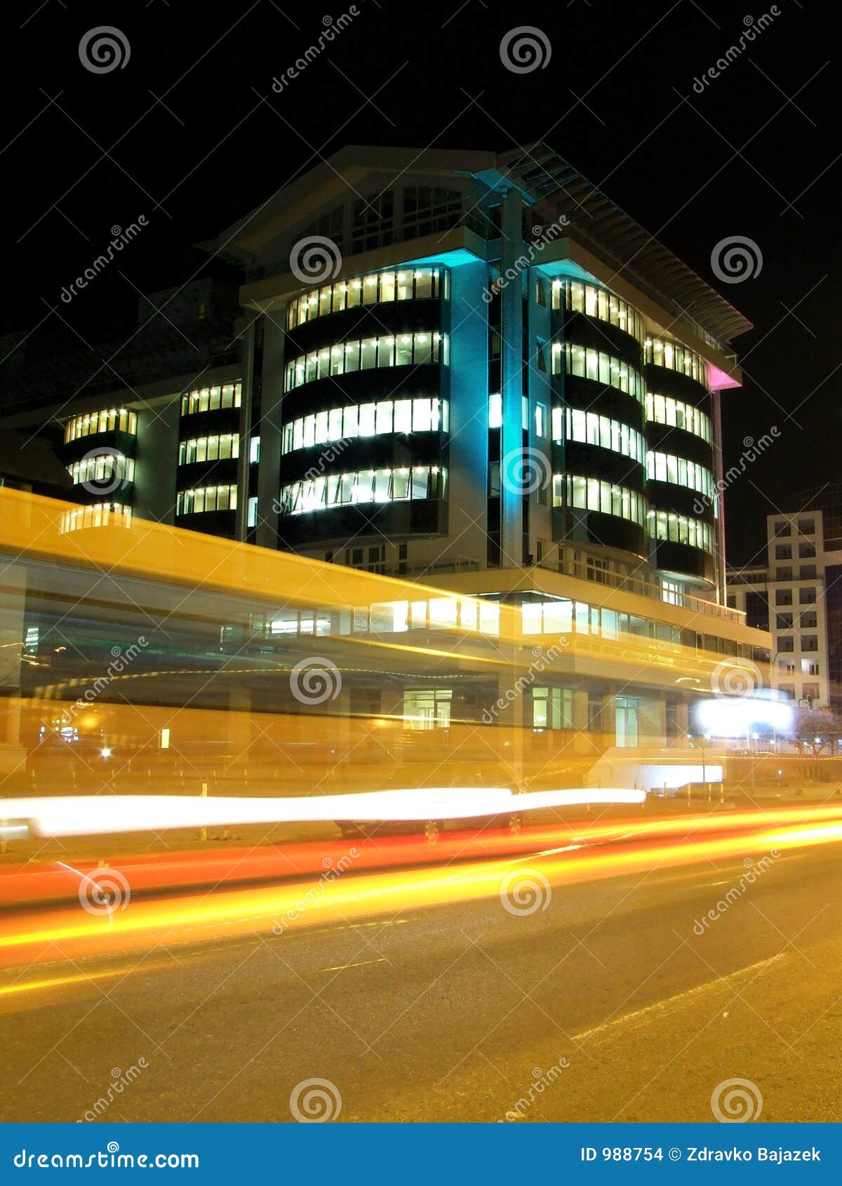 Modern building by night stock photo. Image of cars, speed - 988754