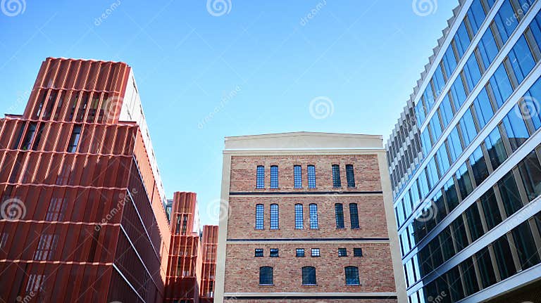 Revitalized Red Brick Building and Modern Office Building. Stock Photo ... Revitalized Red Brick Building and Modern Office Building. Stock Photo ...